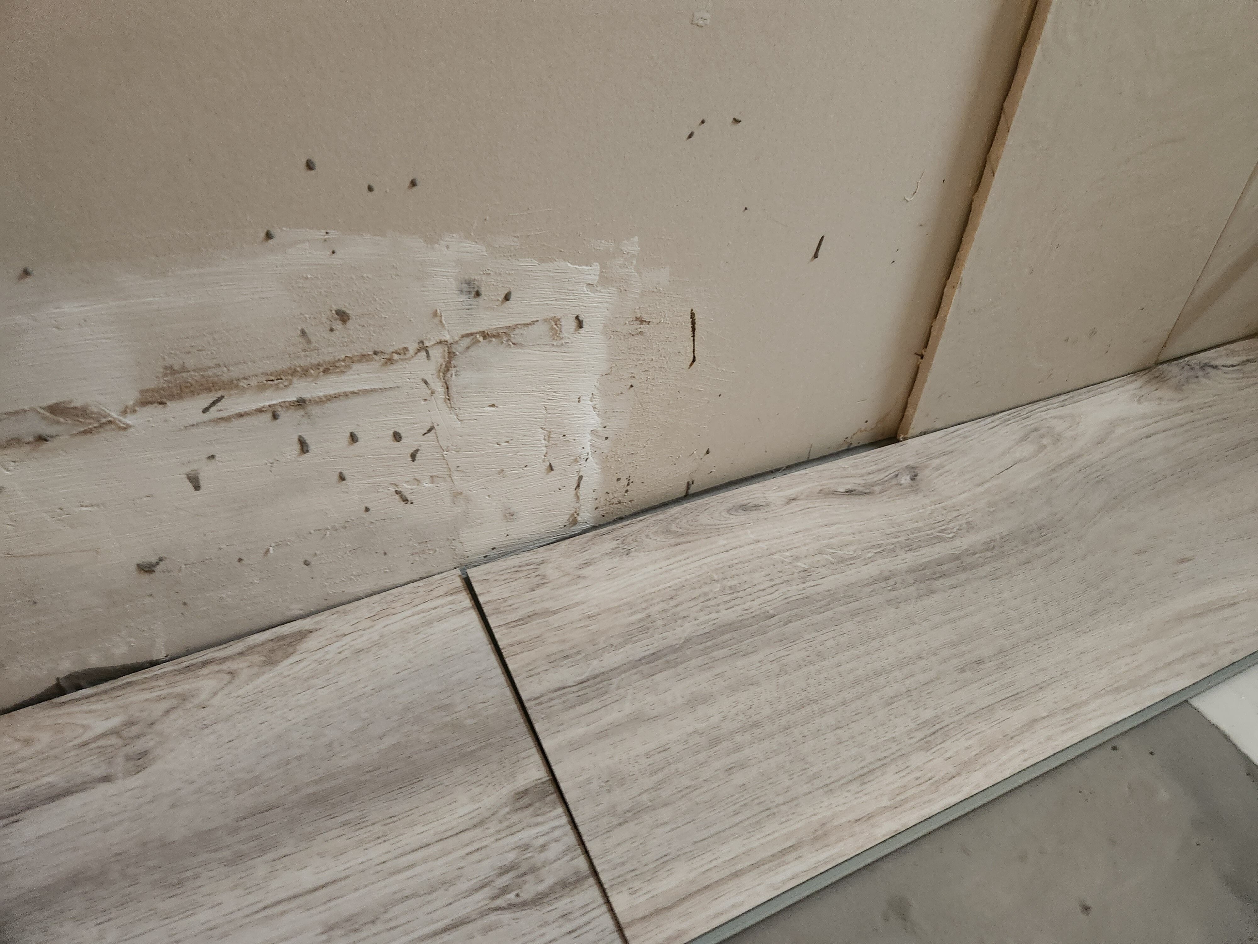 Best way to handle vinyl close to tiled wall. - RedFlagDeals.com Forums
